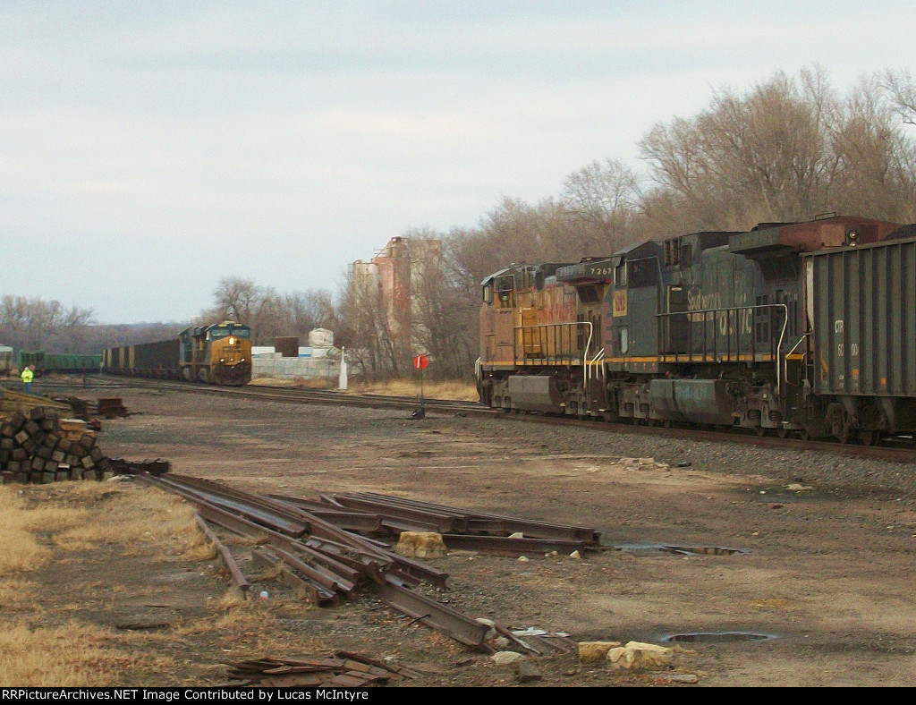 UP 7267 on eastbound UP loaded coal train meeting CSXT 840 on westbound UP empty coal train